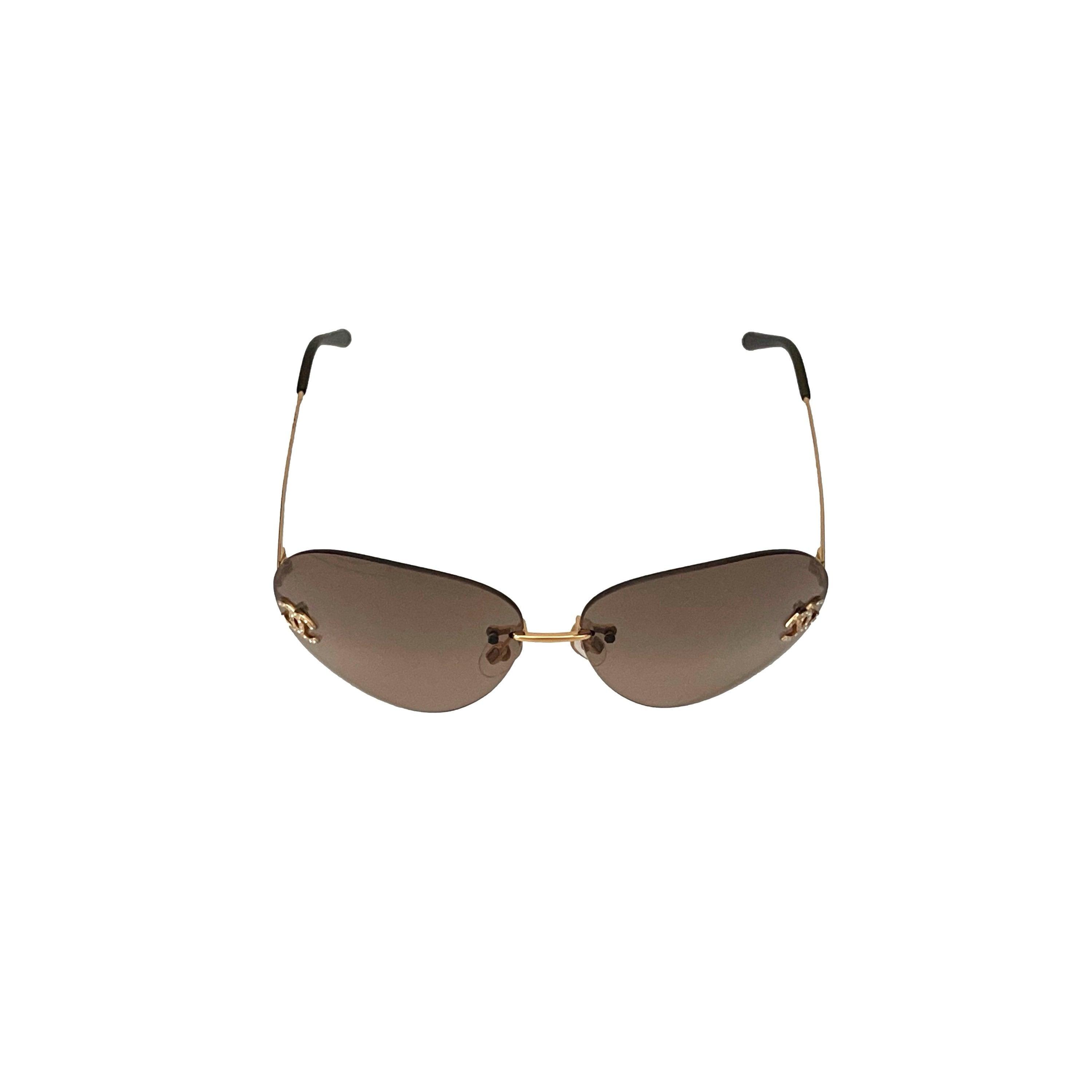 Treasures of NYC - Chanel Smoke Logo Rimless Aviator